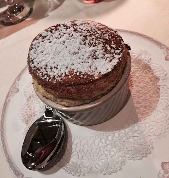 The Grand Marnier souffl&eacute; rises to the occasion, literally defying gravity and your willpower simultaneously.