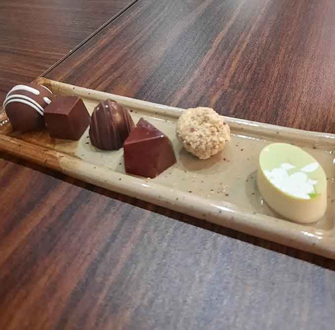 This lineup of artisan chocolates looks like the world's most delicious police lineup, and you're guilty of wanting them all.