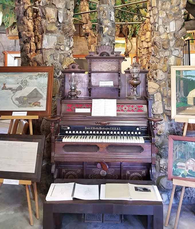 An antique piano surrounded by stone columns, because normal concert halls are clearly overrated around here.