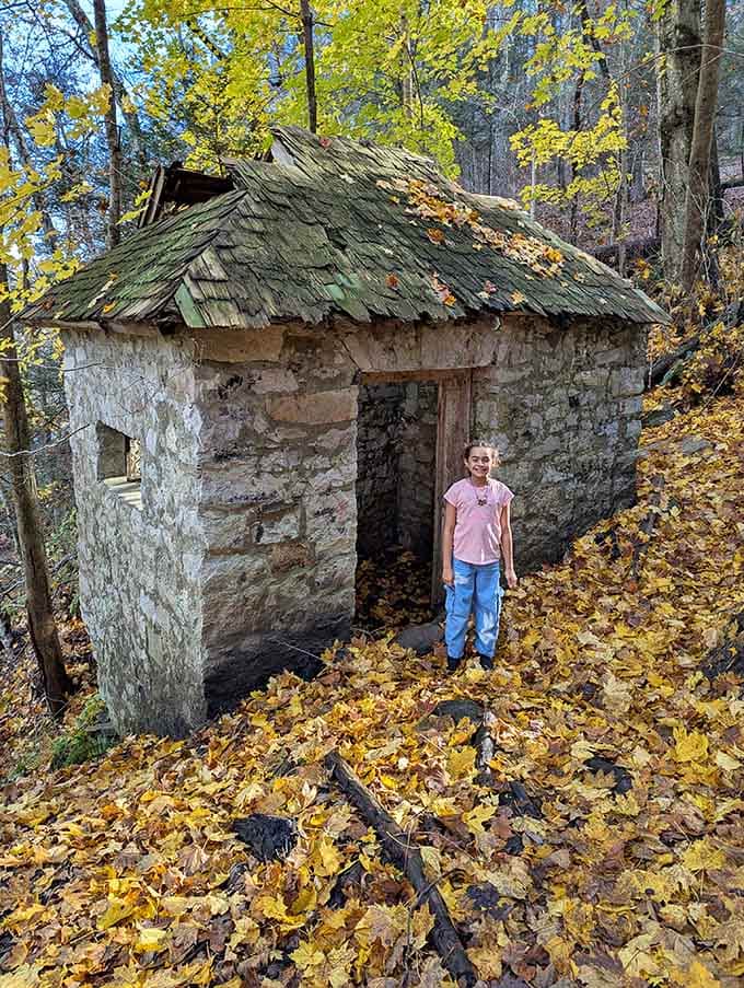Historic stone structures dot the landscape, proving that even ruins can be photogenic when surrounded by fall foliage.