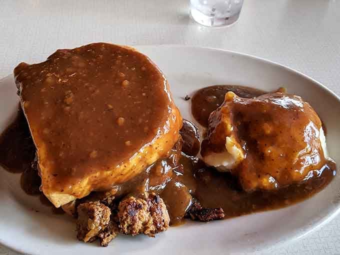 Homemade meatloaf smothered in gravy proves that some traditions exist because they're absolutely, undeniably perfect.
