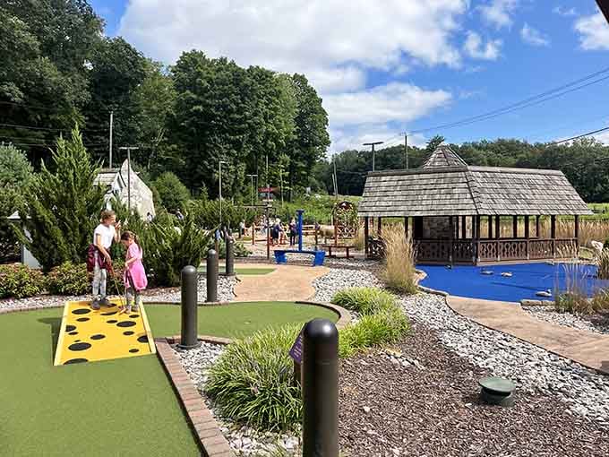 Nothing says "family bonding" quite like competitive putting under a Connecticut sky pretending to be Swiss.