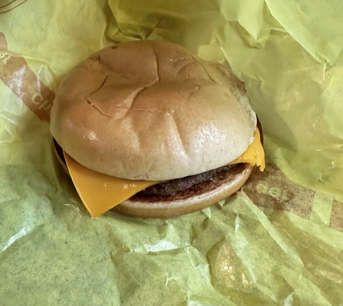 This cheeseburger sits on a mansion's table, finally getting the respect it never knew it deserved all along.