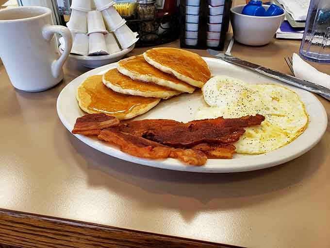 Golden pancakes stacked high with crispy bacon&mdash;this is what Saturday mornings were invented for, folks.