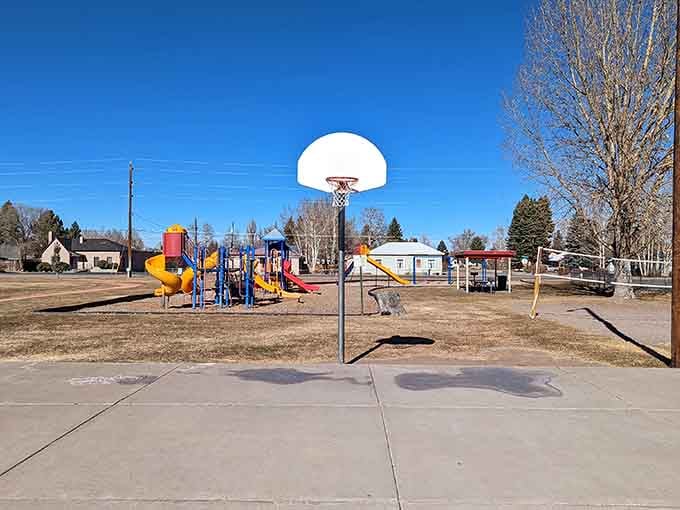 Neighborhood basketball courts stand ready for pickup games, no reservation app required for this kind of fun.