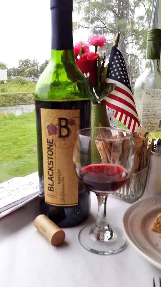 Wine and scenery rolling by&mdash;because solving murders is thirsty work that deserves proper refreshment and ambiance.