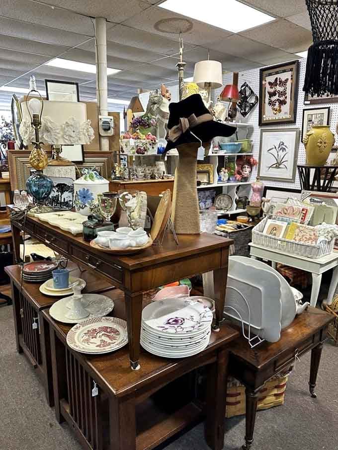 Stacked plates, vintage glassware, and quirky collectibles create a visual feast that demands closer inspection.