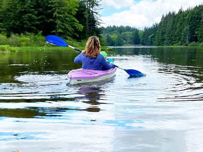 Paddling across pristine waters where the only traffic jam involves ducks and the occasional curious fish below.