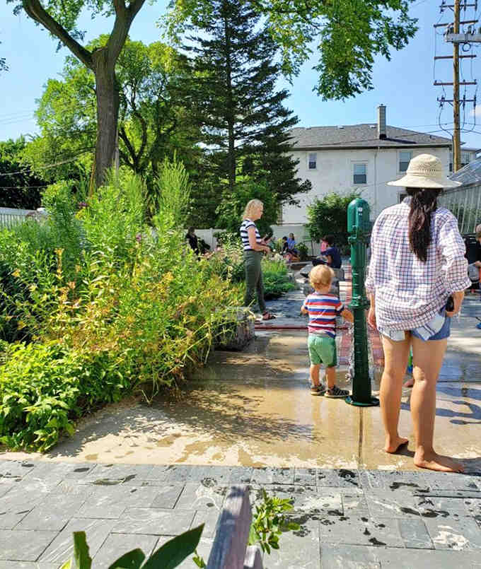 Little explorers discovering that nature beats screen time, one greenhouse adventure at a time.
