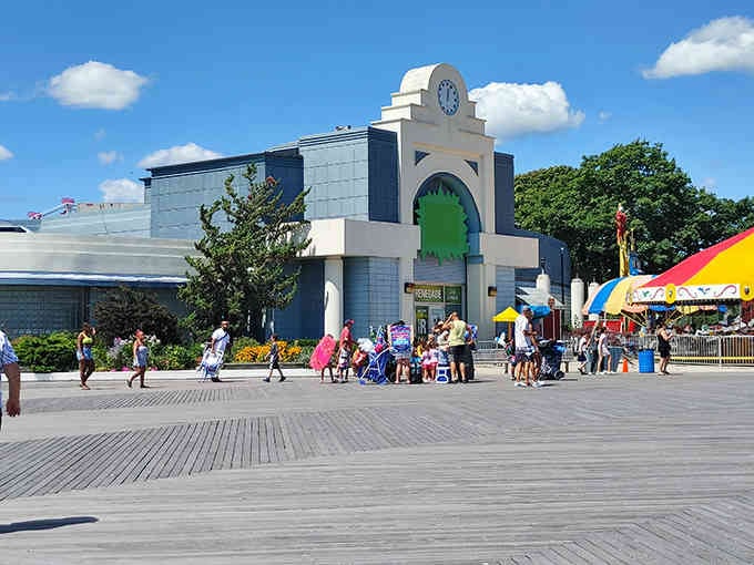 The boardwalk buzzes with that perfect summer energy, families creating memories that'll last long past Labor Day.