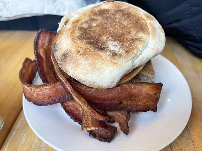 Perfectly toasted English muffin meets crispy bacon in a breakfast marriage that would make any matchmaker proud and hungry.