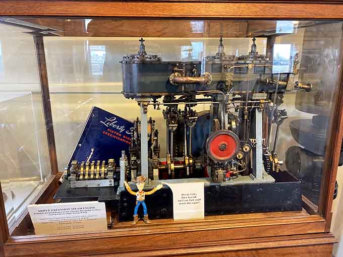 This intricate steam engine model showcases the mechanical genius that powered an entire era of river transportation and commerce.