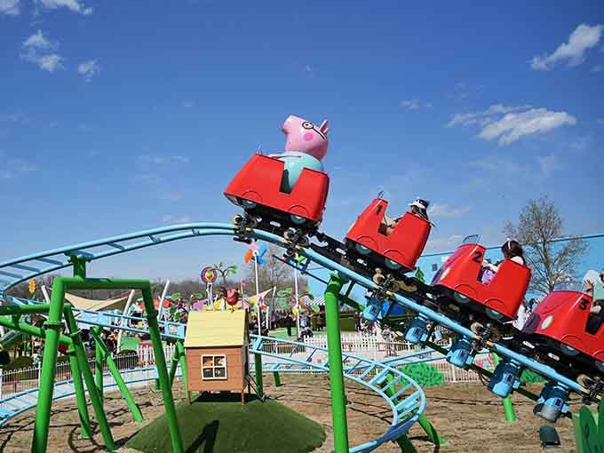 Red car roller coaster seats that prove sometimes the best thrills come in pint-sized packages with maximum charm.