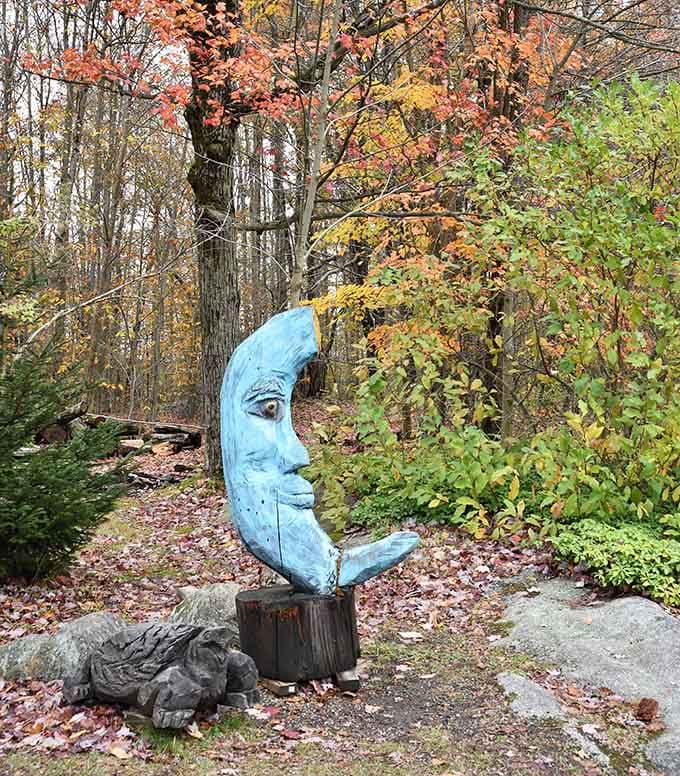 This whimsical crescent moon sculpture adds a touch of artistic charm to an already magical forest setting worth discovering.