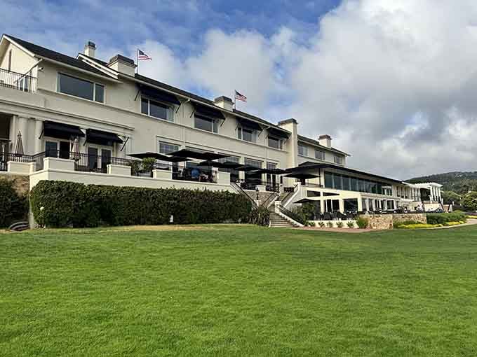The Lodge overlooks the 18th like a proud parent watching their overachieving child graduate with honors.