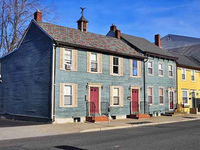 These charming wooden row houses showcase affordable living with character that modern condos can't replicate at any price.