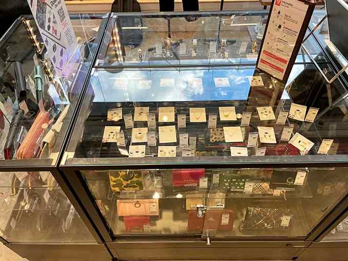 Glass cases protecting jewelry treasures like they're museum pieces, because honestly, some of them basically are.