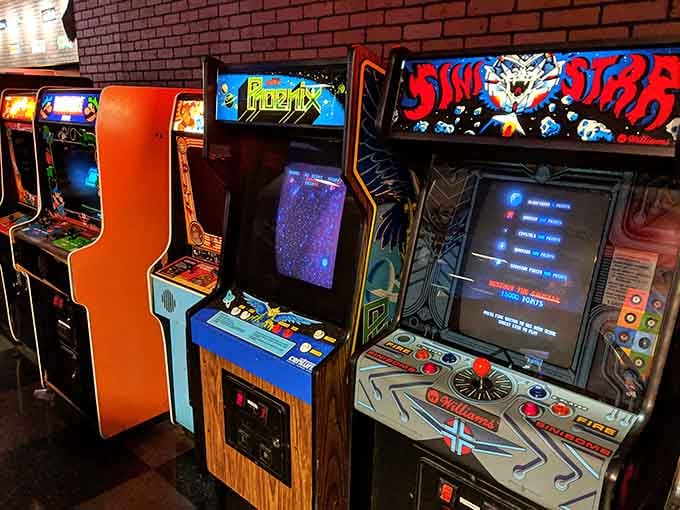 Classic arcade cabinets stand ready to transport you back to when quarters were actual currency.