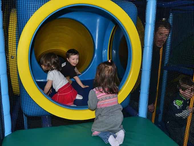 When toddlers discover the porthole windows, they transform into tiny submarine captains surveying their colorful kingdom below.