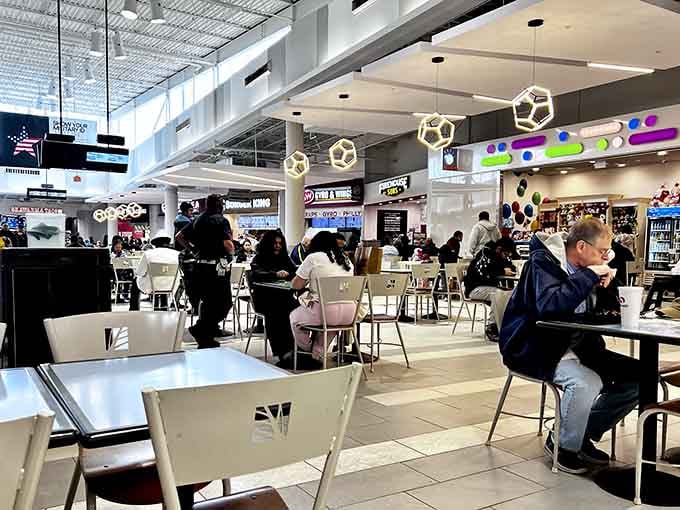 The food court offers respite for weary shoppers, complete with geometric ceiling art that's surprisingly Instagram-worthy.