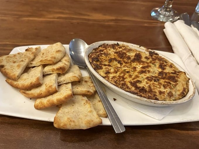 Crab dip with Old Bay and toasted bread is Virginia's way of saying we take our seafood seriously around here.