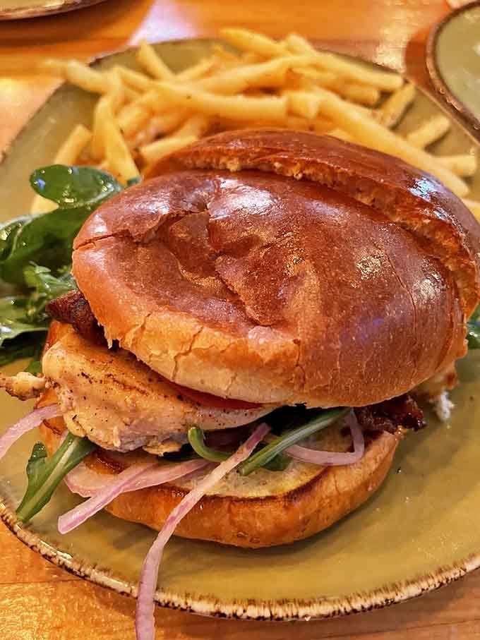This chicken sandwich stacks up beautifully, making you reconsider everything you thought about entertainment venue food.