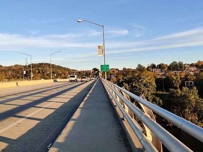 Golden hour light stretches across the bridge, painting everything in that warm glow photographers dream about nightly.