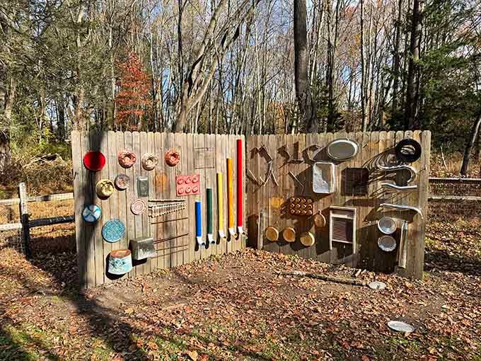 A musical fence that turns random objects into instruments, delighting kids and confusing adults since installation.