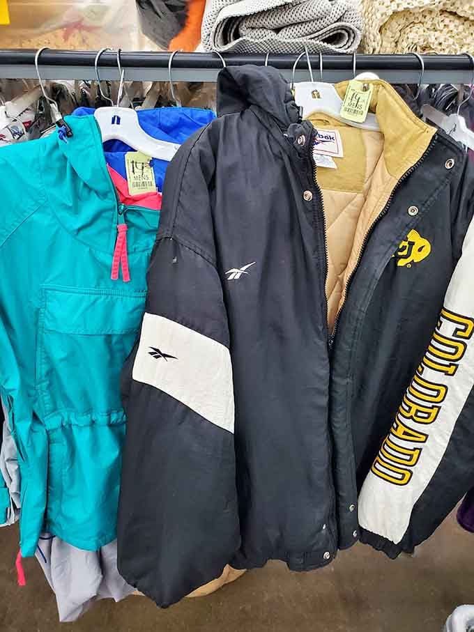 Vintage windbreakers that scream "I survived the '90s and I've got the jacket to prove it!"