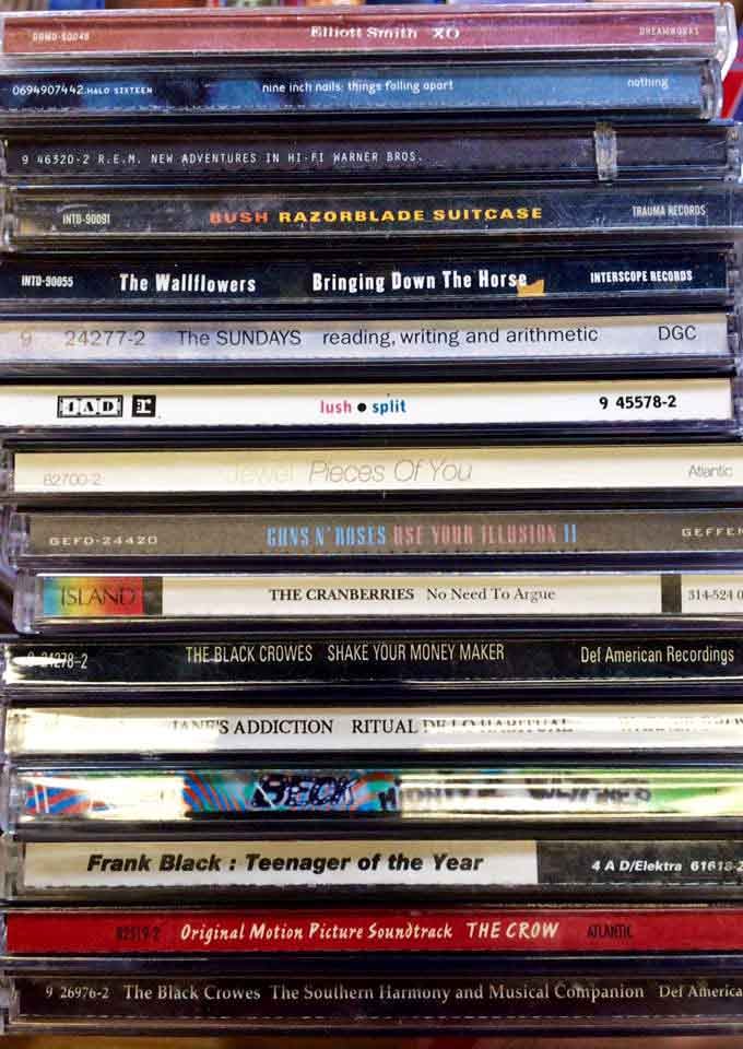 A stack of '90s CDs that'll transport you back to when we thought these shiny discs were the future.