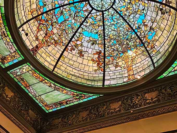 Looking up at this stained glass dome is like finding a rainbow decided to retire indoors permanently.