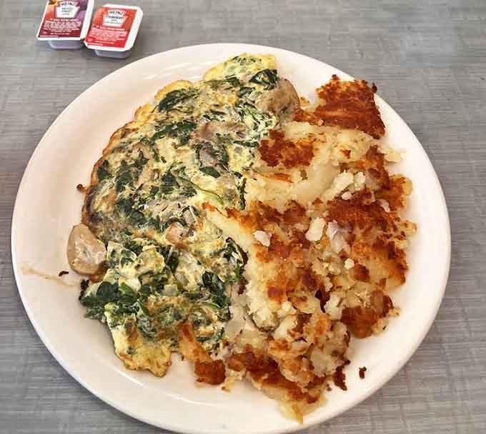 That Florentine omelet proves vegetables can be just as exciting as bacon when prepared with proper diner expertise.