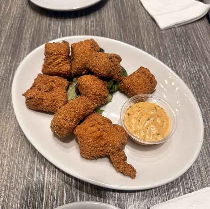 Golden-fried salmon bites with that dipping sauce are basically edible proof that good things come in small packages.