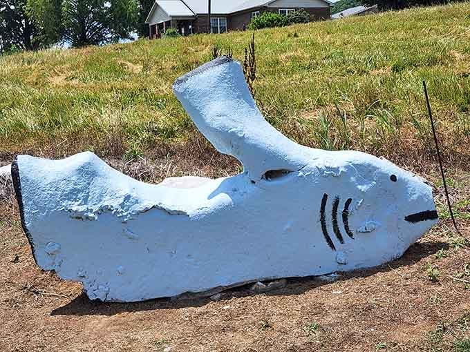 Jaws meets folk art in rural Alabama, proving that even sharks can be charming when they're made of limestone.