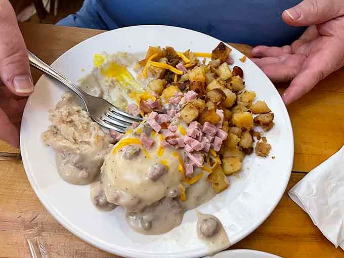 When biscuits and gravy team up with home fries and ham, you've got a breakfast power trio.