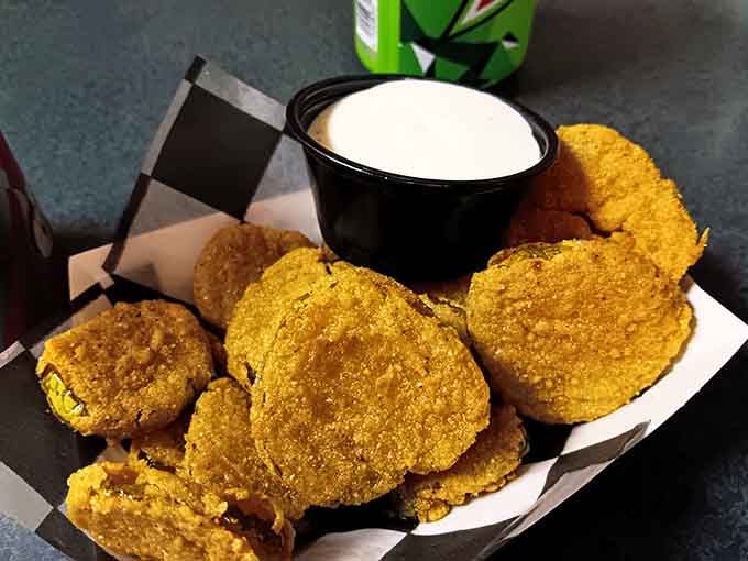 Golden fried pickles with a side of ranch prove that sometimes the best ideas are the simplest ones.