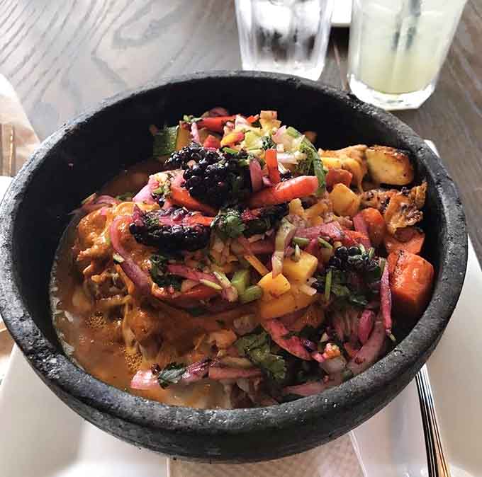 When your pork arrives in a sizzling cazuela, you know the kitchen means serious business about flavor and presentation.