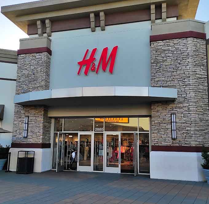 H&M standing proud, ready to dress you like a Scandinavian minimalist without the Scandinavian price tag attached.