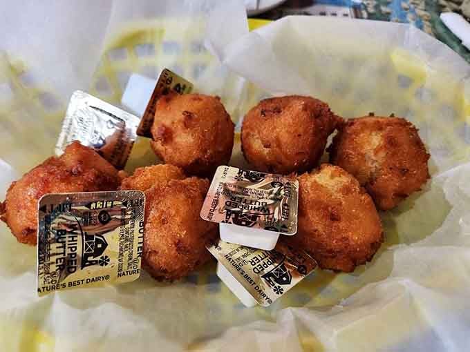These crispy hush puppies are dangerously addictive little spheres of cornmeal heaven with butter.