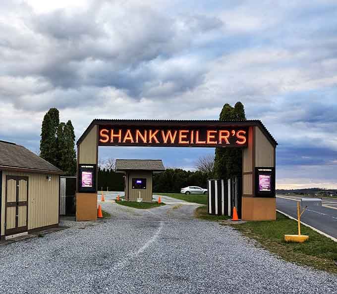 That glowing entrance sign welcomes you to step back in time for an authentic slice of American entertainment history.