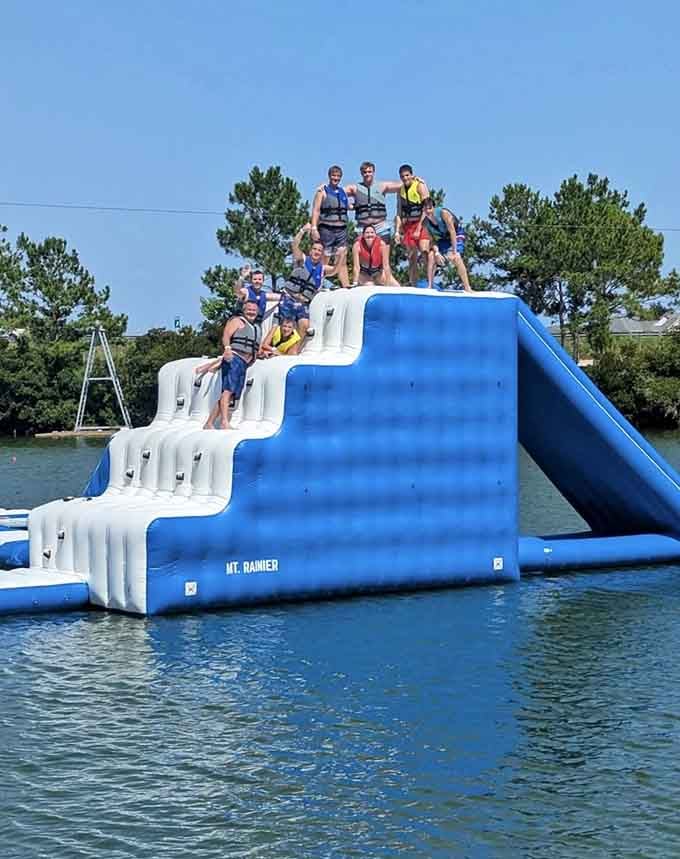 Nothing says family bonding quite like watching each other attempt to conquer an inflatable mountain together.