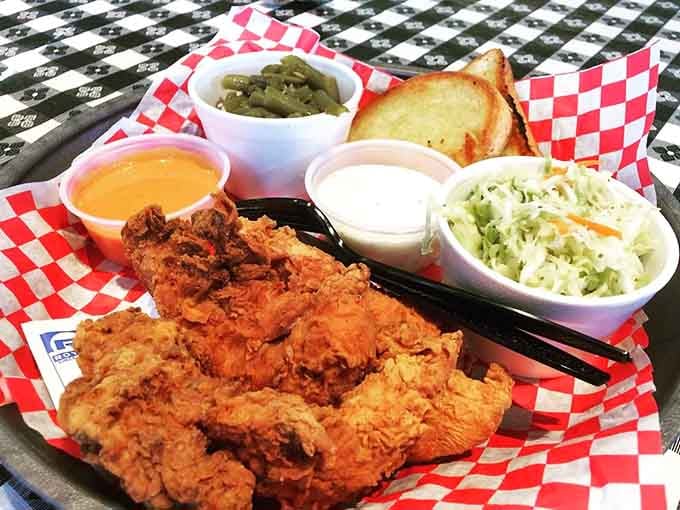 Golden fried chicken arrives with all the fixings, making you forget you're dining beside a range.