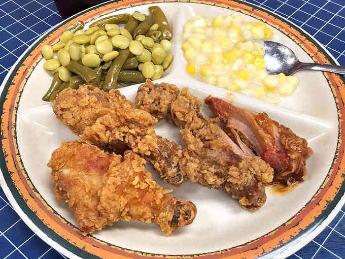 Golden fried chicken, creamed corn, and lima beans create a Southern symphony that'll make your taste buds sing.