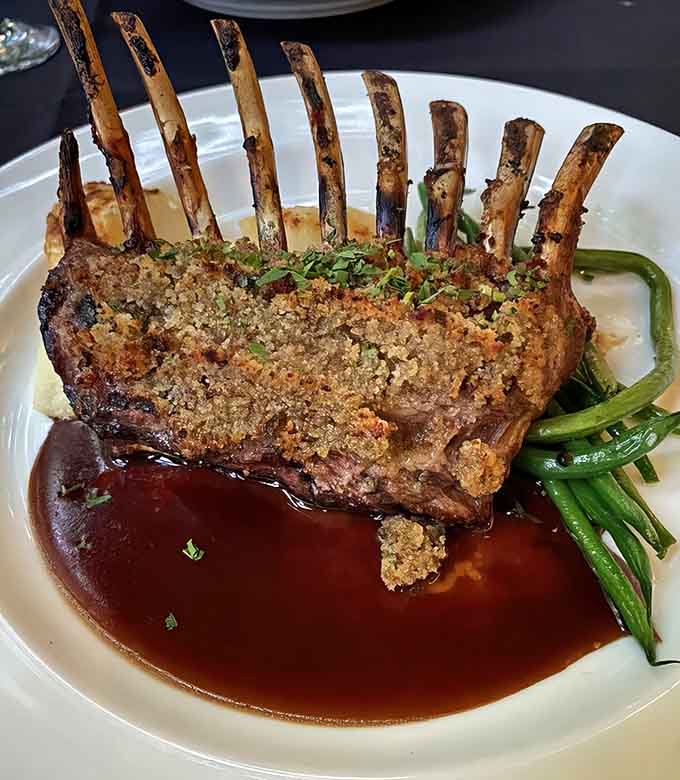 This rack of lamb stands at attention like it's auditioning for a culinary honor guard position.