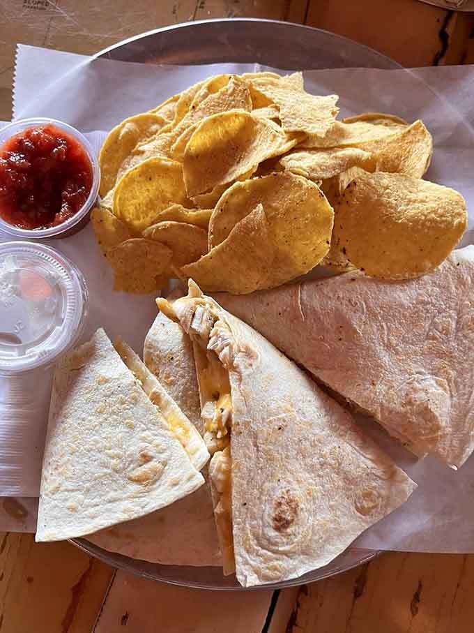 Golden quesadilla wedges paired with crispy chips prove that comfort food doesn't need to be complicated to be perfect.