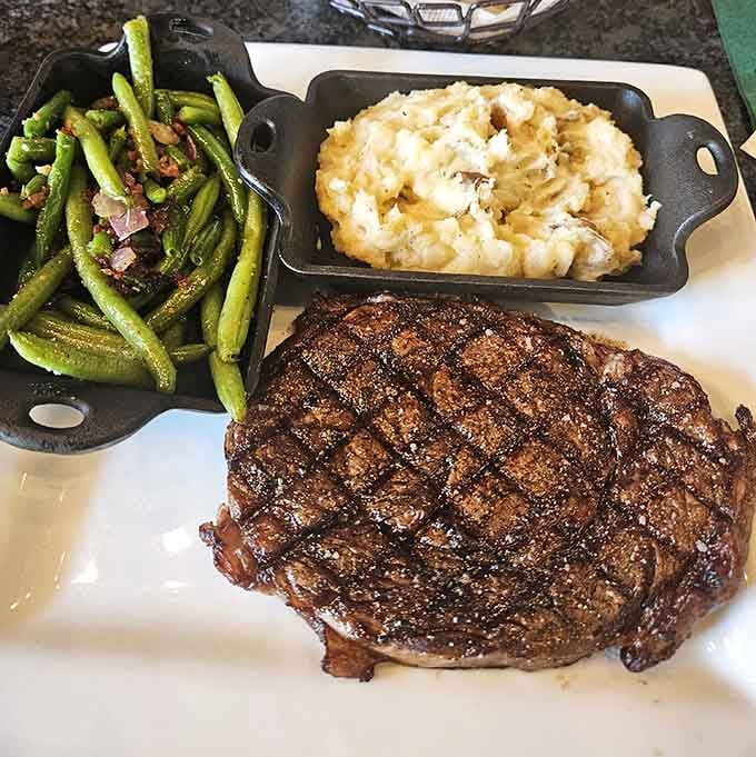 That ribeye char is so perfect it could teach a masterclass on how to make carnivores weep with joy.