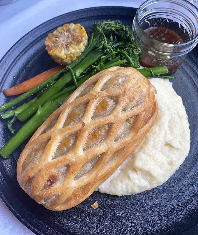 Beef Wellington isn't just fancy, it's a test of kitchen skill, and this golden pastry-wrapped masterpiece passes with honors.