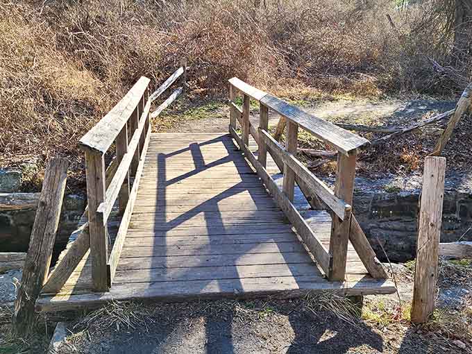 This charming wooden bridge crosses babbling streams, making you feel like you're in a Hallmark movie without the commercials.