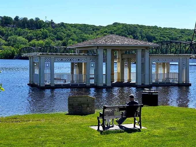 That elegant gazebo floating on the water looks like someone's fancy lake house decided to go for a swim.
