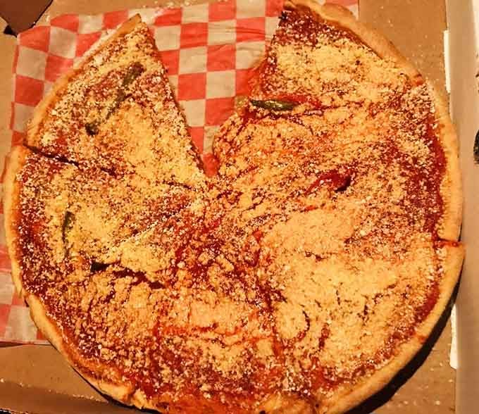 That Old World Pizza wears its cheese and seasoning like a crown, proving simplicity done right wins every time.